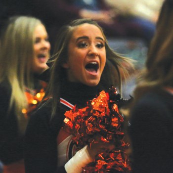 Going for the victory... Cheerleaders, coaches know what's on the line ...