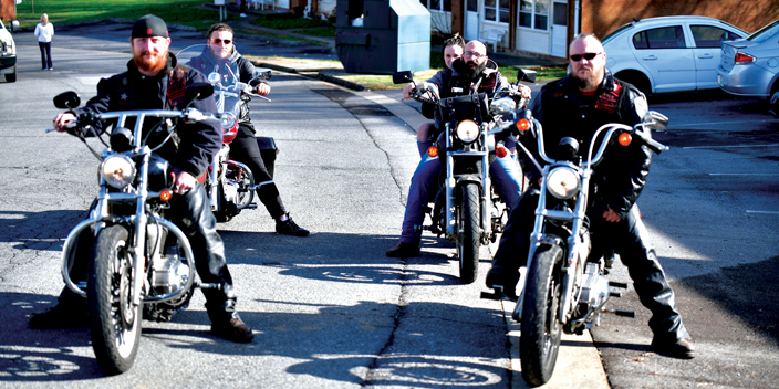 Spreading the joy of Christmas... Santa and Ghost Riders make the ...